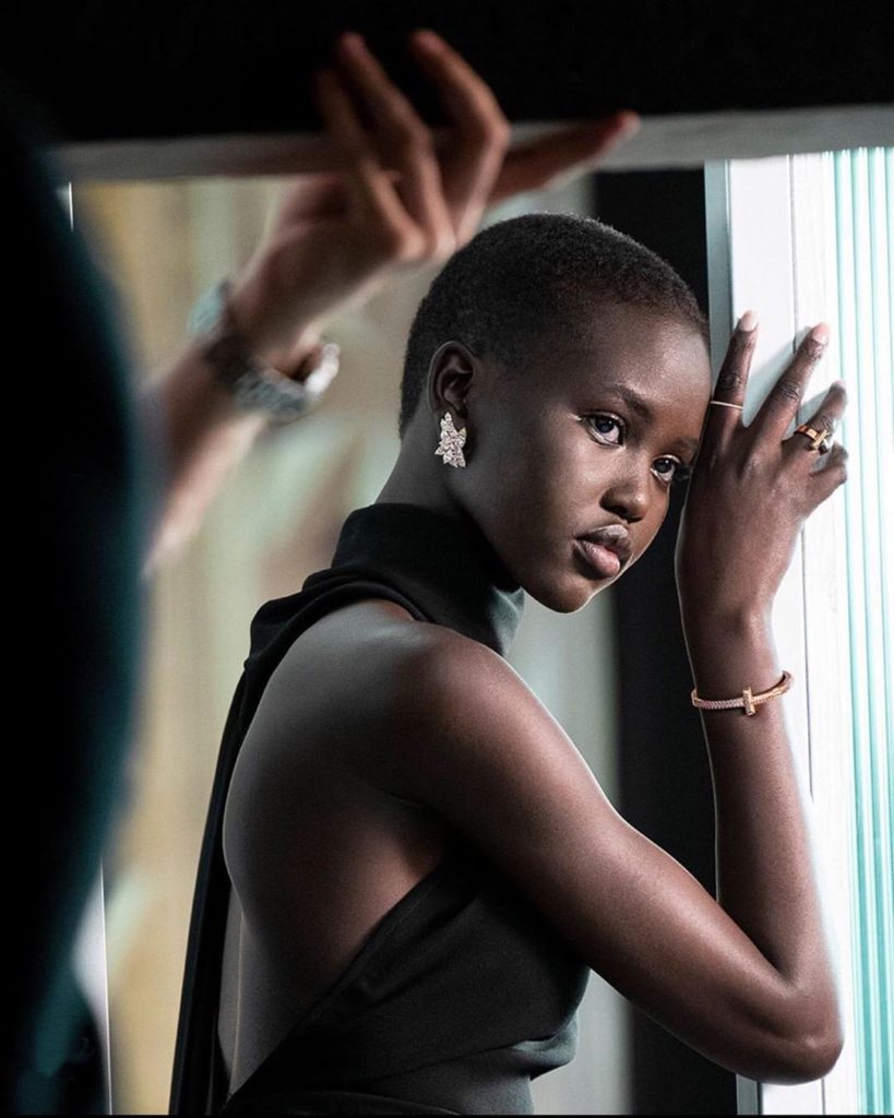 Runtown engages his South Sudanese model girlfriend, Adut Akech (Video)