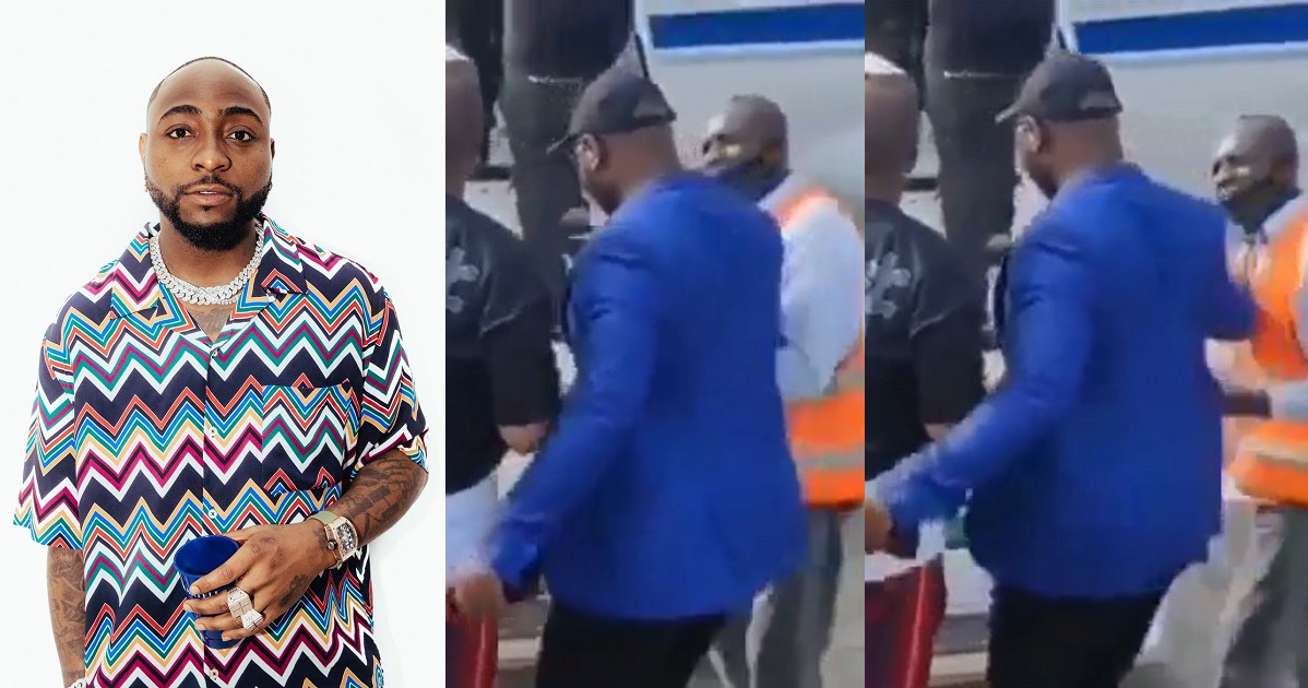 Moment Davido's bodyguard shoved an airport official who wanted to snap ...